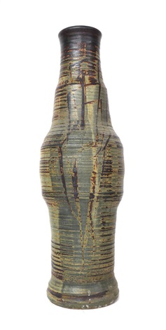 a stoneware pot, of tapering form with brushed iron oxide or manganese ...