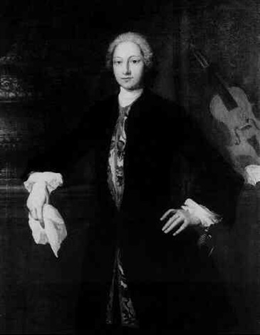 Portrait of Paul Pooley, standing, a violin and music in a niche behind ...