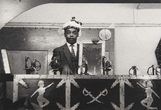 Charlie Lucas with sword box, Huberts Museum, NYC by Diane Arbus on artnet