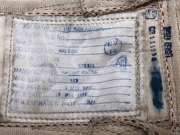 Apollo Block II Command Module parachute, 83½ feet in diameter. Red ...