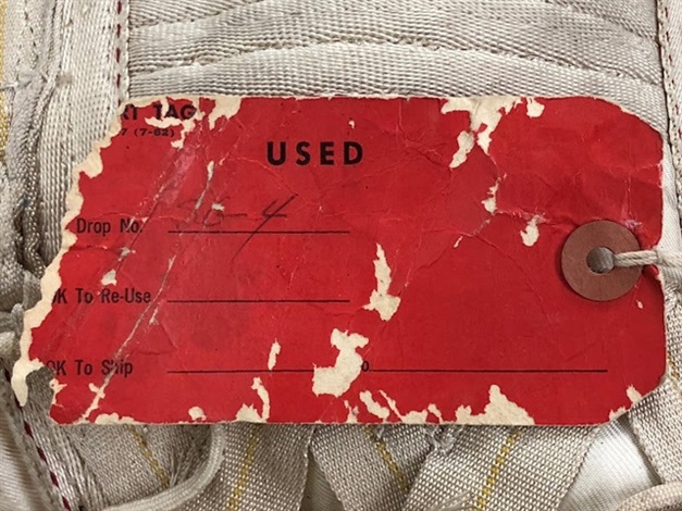 Apollo Block II Command Module parachute, 83½ feet in diameter. Red ...