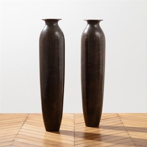 Pair of monumental vases by Jean Dunand on artnet