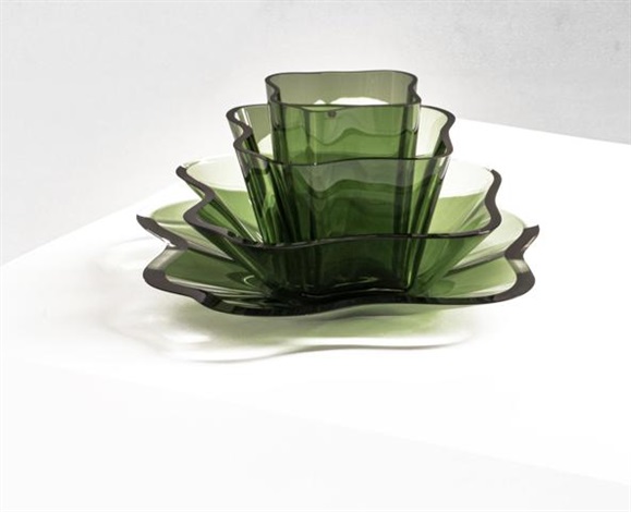 Set of four flower vases by Alvar Aalto on artnet