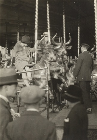 Roundabout at the fun fair by Germaine Krull on artnet