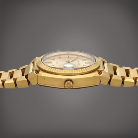 Rolex. Texan, Reference 5100 A yellow gold wristwatch with date and ...
