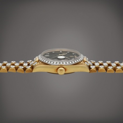 Rolex. Day-Date Octopus, Reference 18048 A yellow gold and diamond-set ...