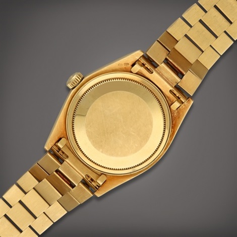 Rolex. Day-Date Octopus, Reference 18048 A yellow gold and diamond-set ...