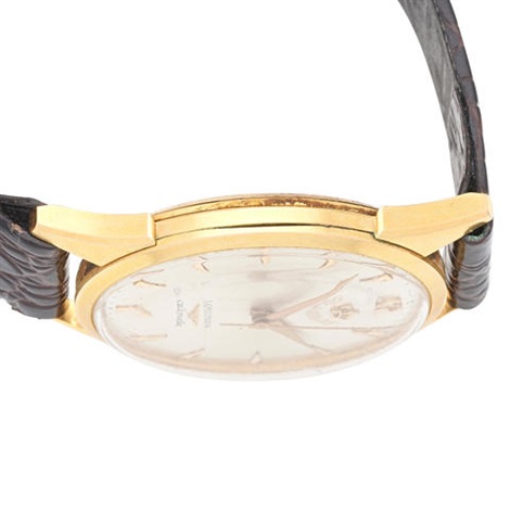 Longines. A gold plated automatic wristwatch with the crest of King ...