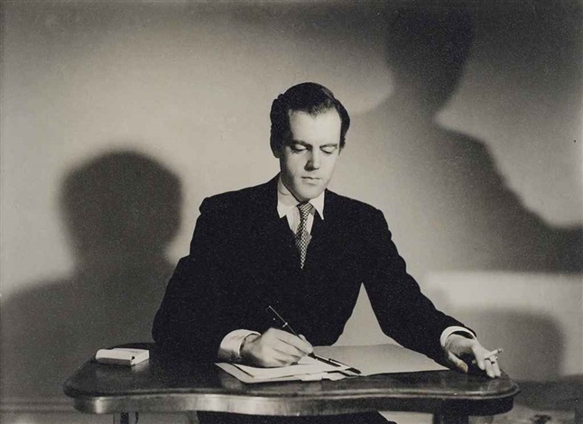 Simon Fleet at writing table by John Deakin on artnet