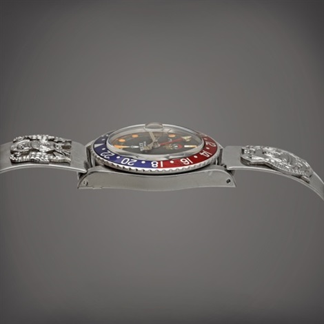 Rolex. GMT-Master Desert Eagle, Reference 1675 A stainless steel dual ...