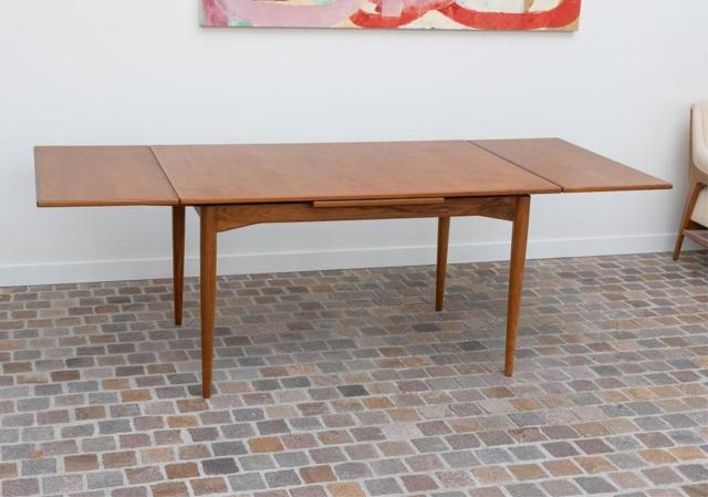 Teak 2-leaf extension Dining Table by Parker Furniture (Co.) on artnet