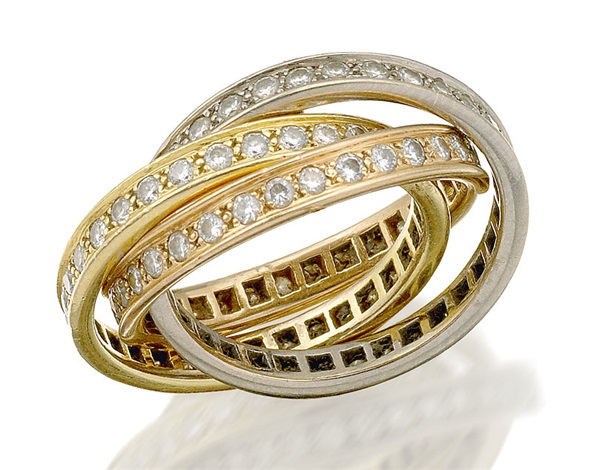 Trinity ring designed as three entwined full circle by Cartier (Co.) on ...