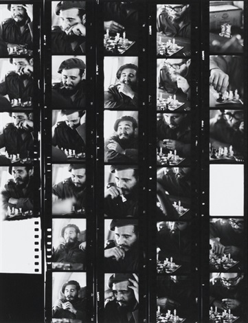 Fidel Castro smoking cigar and playing chess by Alberto Korda on artnet