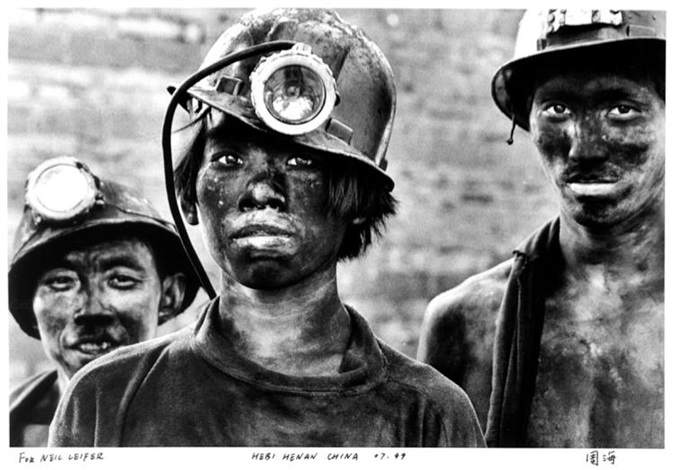 Three Chinese miners, with faces blackened from the mine by Zhou Hai on ...
