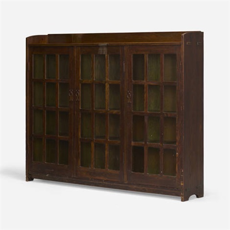 Early three-door bookcase by Gustav Stickley on artnet