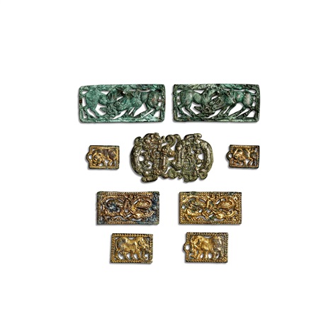 A group of eight bronze plaques, Northern China, Han dynasty on artnet