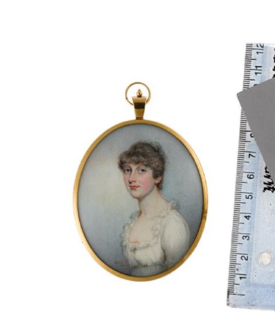 A lady, called Miss Patricia Beecham, wearing white dress, white belt ...