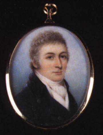 A gentleman wearing blue coat with gold coloured buttons and black ...