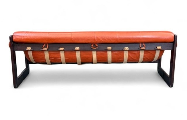 A Percival Lafer Brazilian, b. 1936 sofa with orange leather and wooden ...