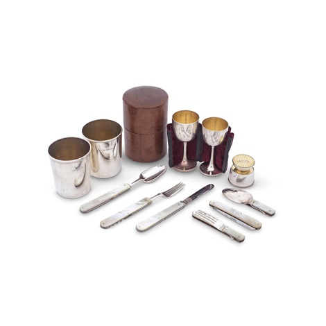 An unusual Victorian silver and leather cased campaign travelling set by Frederick Davies and ...