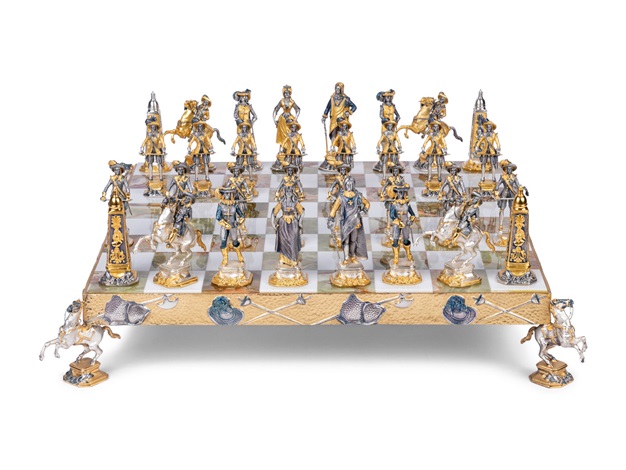 A Piero Benzoni Silver and Silver-Gilt Chess Set by Piero Benzoni on artnet