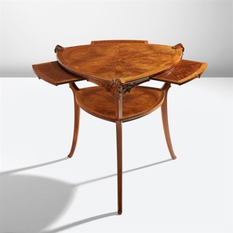 Two-tier table with integrated trays by Lucien Lévy-Dhurmer on artnet