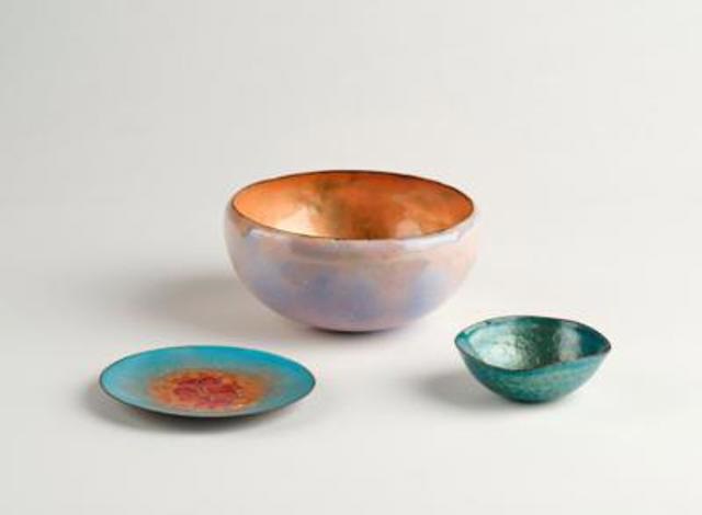 Nora Grill, a round bowl and a rounded bowl with plate and a chain ...