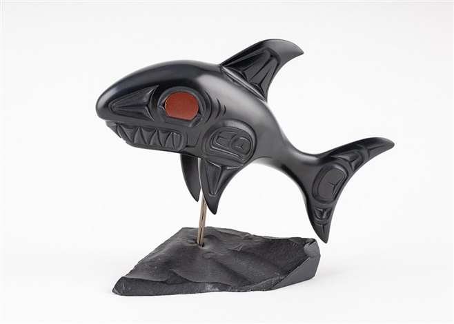 a carved argillite and catlinate carving of a Haida Shark by Francis ...