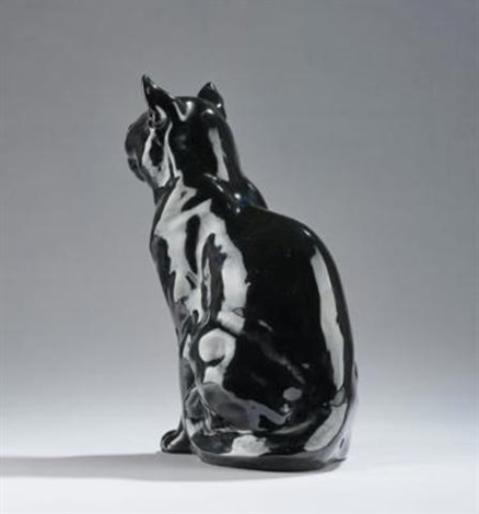 A large seated cat, model number 1227, executed by Wiener ...