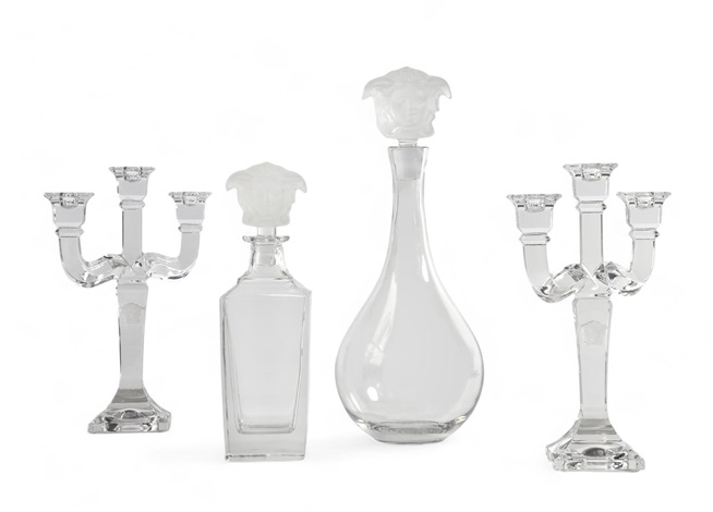 A group of Versace for Rosenthal clear and frosted crystal table ...