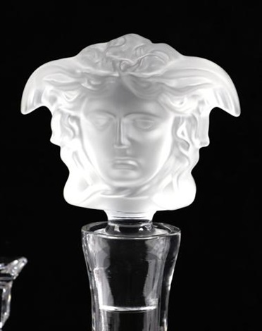 A group of Versace for Rosenthal clear and frosted crystal table ...