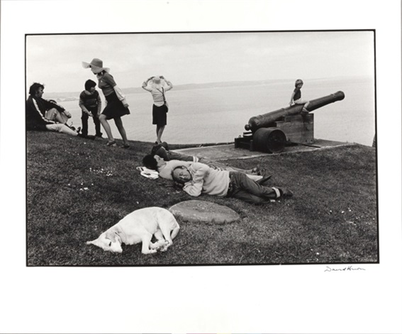 PROMENADE AT TENBY, WALES, GREAT BRITAIN 1974 by David Hurn on artnet