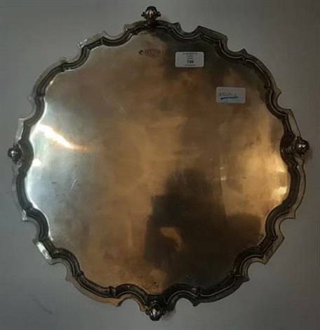 A George V silver salver with Chippendale border. by William Hutton ...