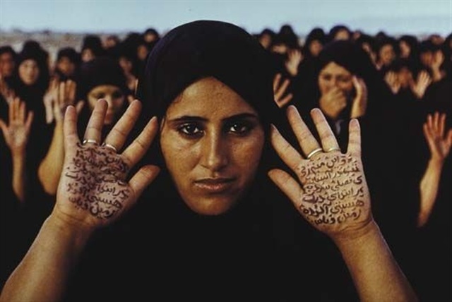 Rapture series - women with writing on hands by Shirin Neshat on artnet