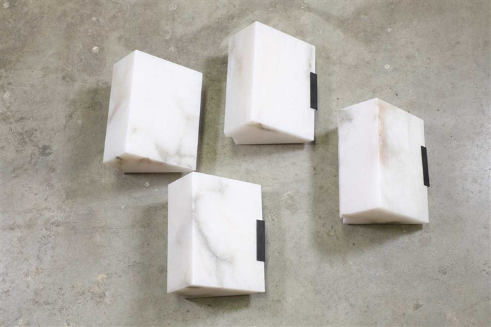 Four alabaster sloping block wall lights by Pierre Chareau on artnet