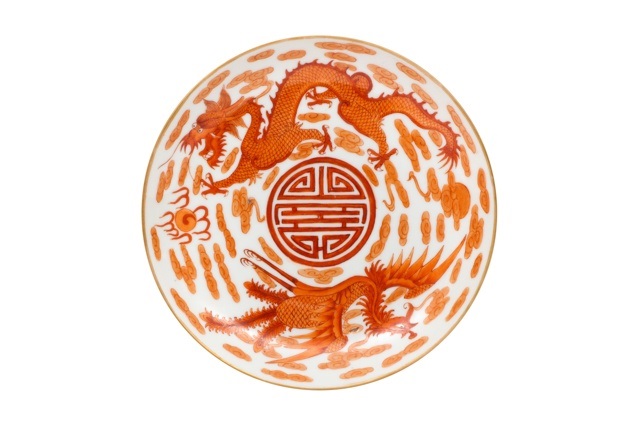 A PAIR OF CHINESE IRON-RED DRAGON AND PHOENIX DISHES. Late Qing Dynasty ...