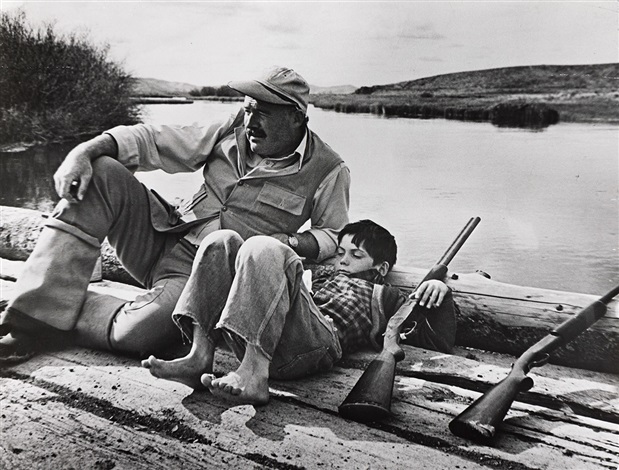 Portrait of the writer Ernest Hemingway 1899-1961 with his son Gregory ...