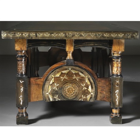 LOW TABLE, WOODEN STRUCTURE, METAL INLAYS by Carlo Bugatti on artnet