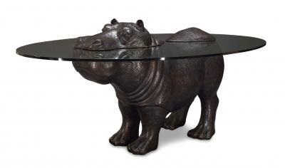 a bronze and glass Hippo dining table c.2000 by Mark Stoddart on artnet
