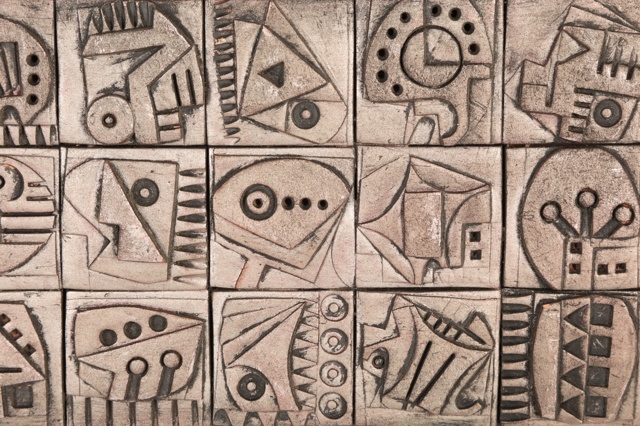 A panel of thirty nine painted terracotta tiles by Ron Hitchins on artnet