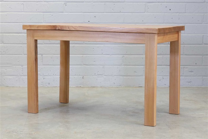 An ash and yew wood centre table by Alan, Sir Peters on artnet