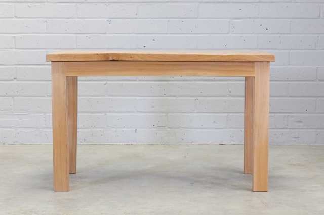 An ash and yew wood centre table by Alan, Sir Peters on artnet