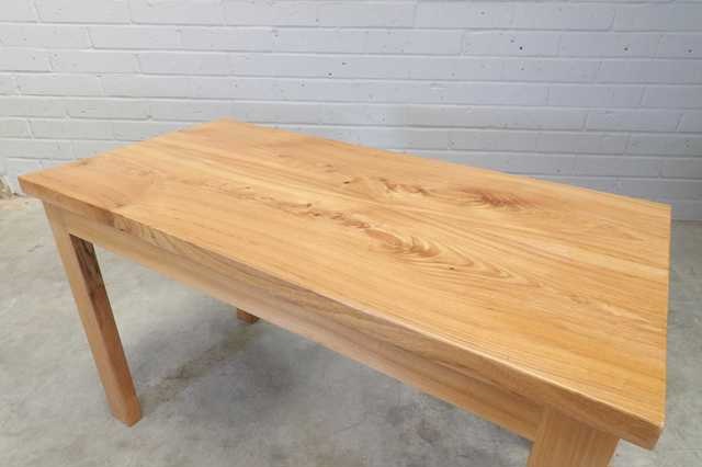 An ash and yew wood centre table by Alan, Sir Peters on artnet