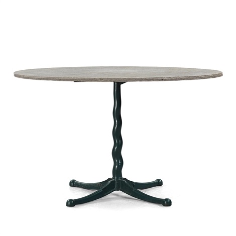 A cast iron table with granite top by Josef Frank on artnet