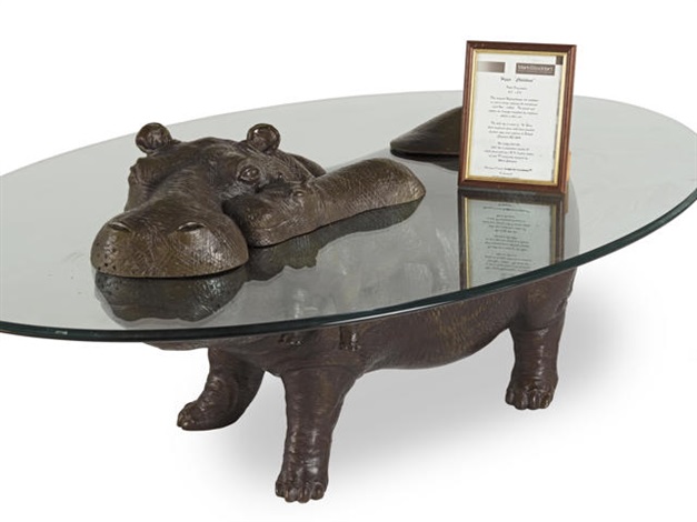 A limited edition patinated bronze and glass Hippo Childhood coffee ...