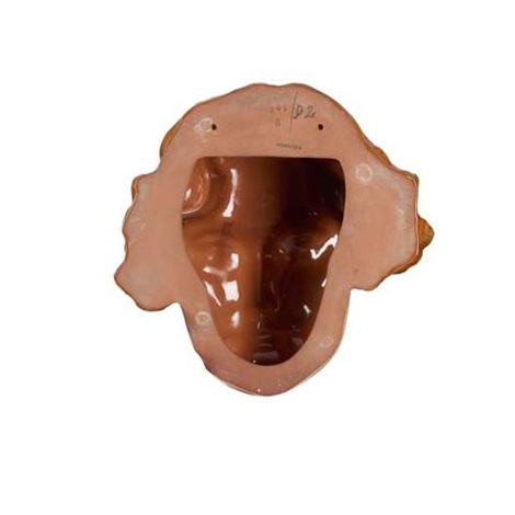 ART DECO WALL MASK, CIRCA 1925 by Rudolf Podany on artnet