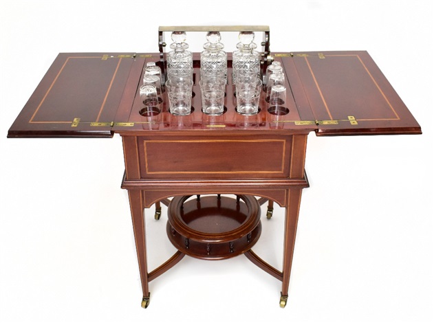 an Edwardian mahogany and satinwood inlaid Surprise drinks cabinet by Thornhill Co Ltd on artnet