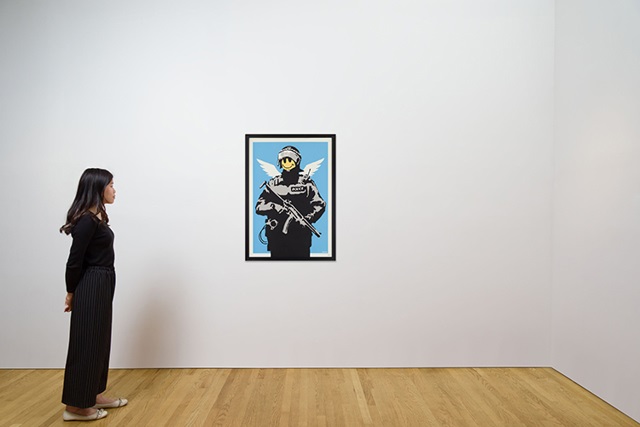 Flying Copper by Banksy on artnet