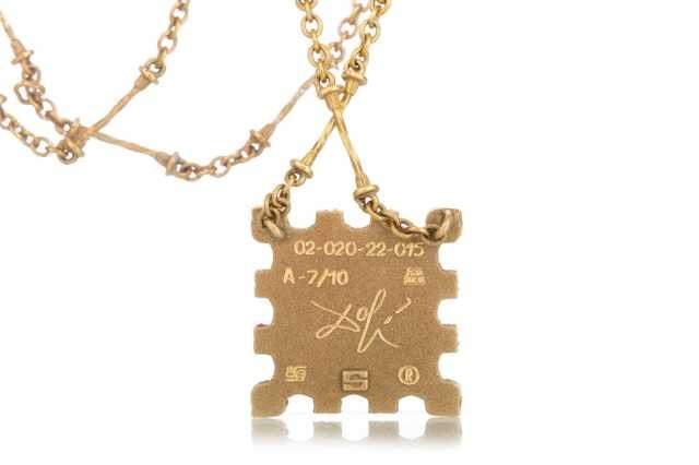 SALVADOR DALI GOLD HARDSTONE CONVERTIBLE PENDANT by Salvador Dalí on artnet