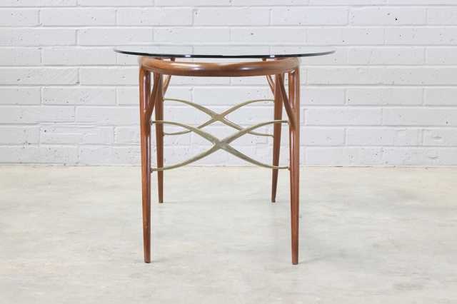 a brass-mounted walnut dining table by Ico Parisi on artnet